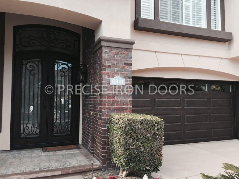 Contemporary Iron Double Entry Exterior Door with Transom